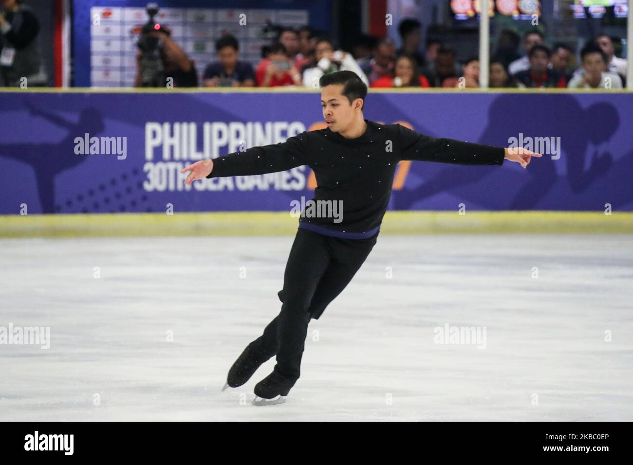 Christopher Caluza of the Philippines performs his routine during the ...