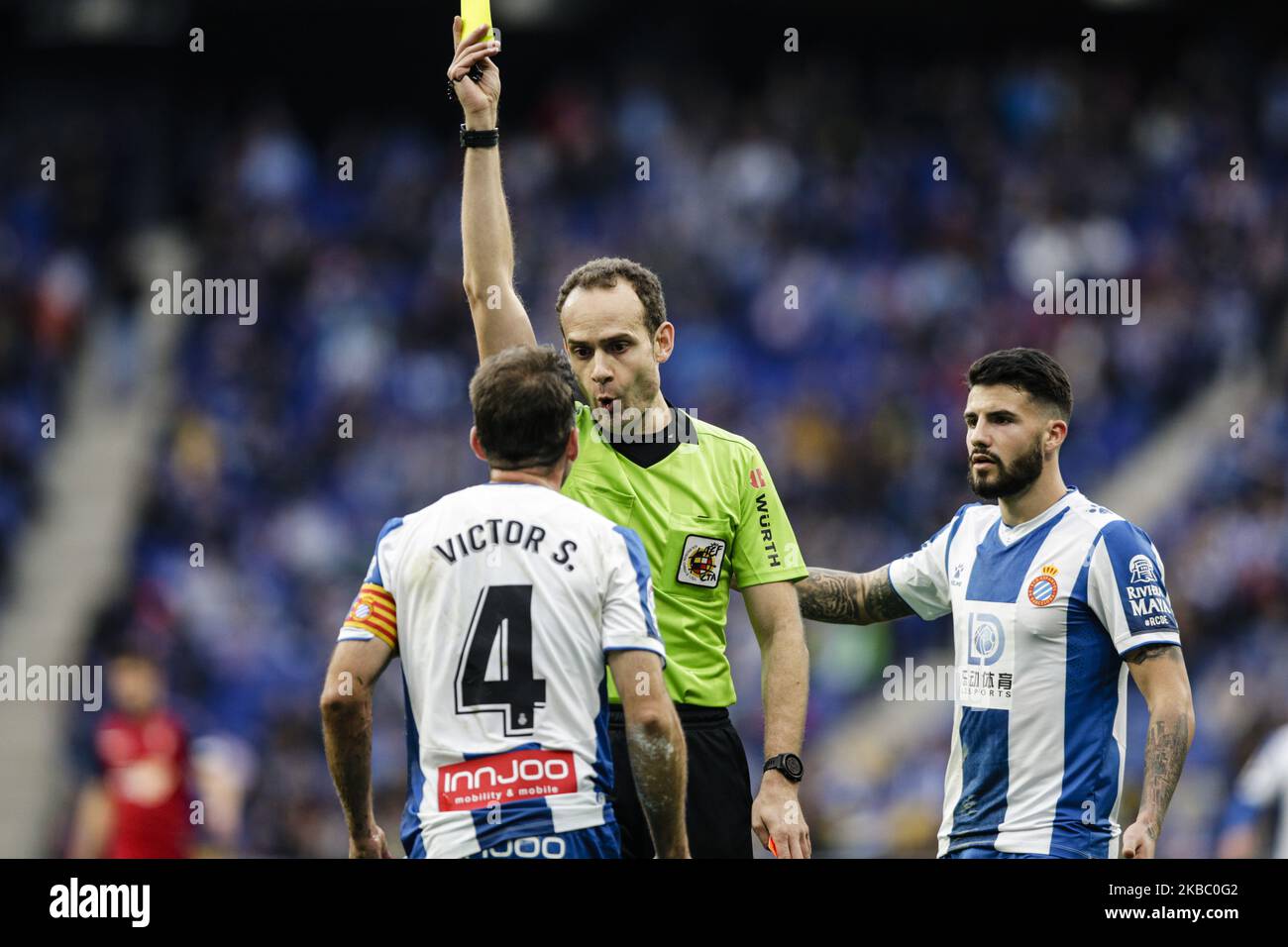 The referee shows yellow card to 04 Sanchez of RCD Espanyol during the ...
