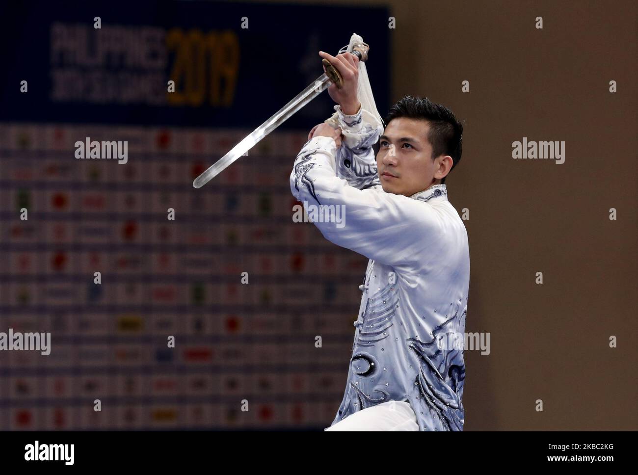 Choon How Loh of Malaysia performs his routine for the Wushu Men’s ...