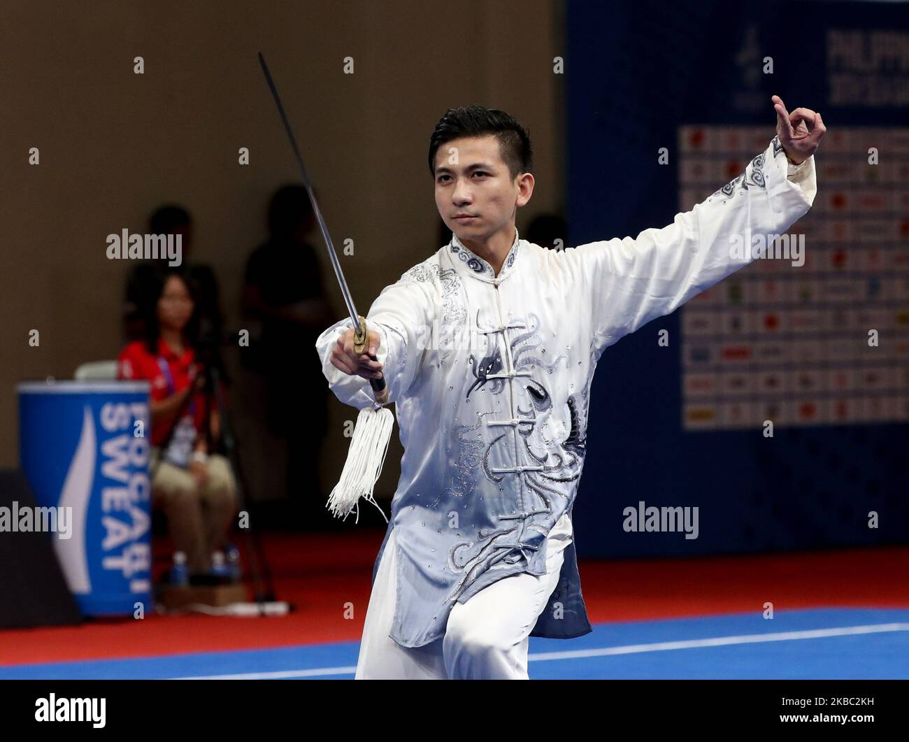 Choon How Loh of Malaysia performs his routine for the Wushu Men’s ...