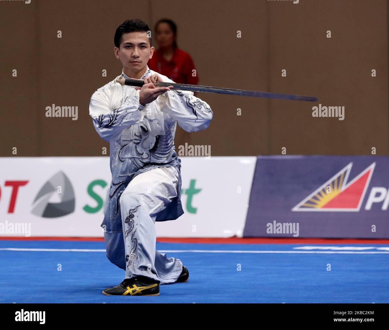 Choon How Loh of Malaysia performs his routine for the Wushu Men’s ...