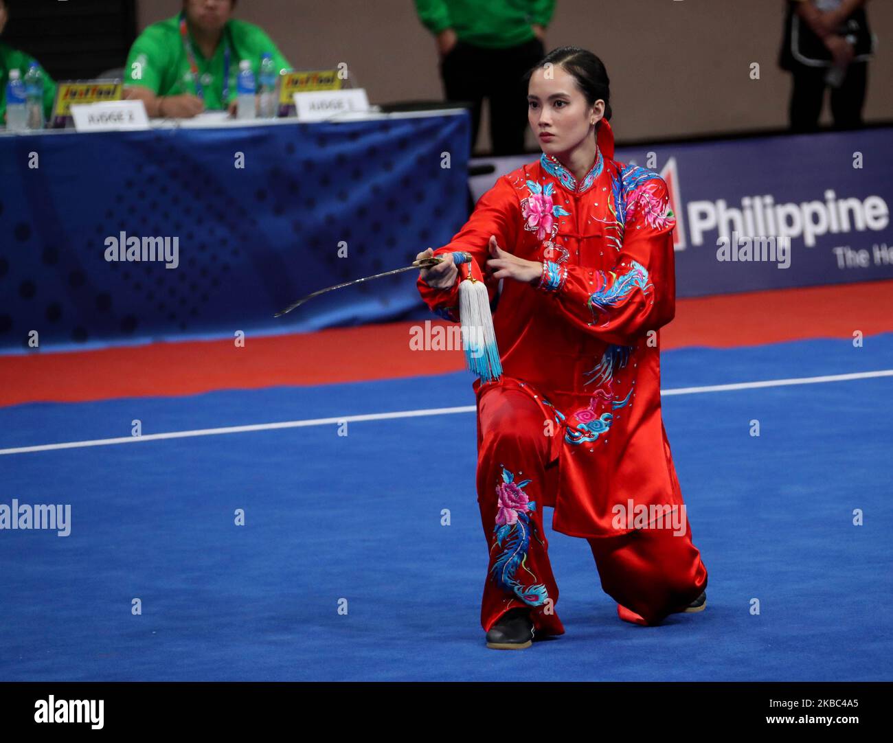 Agatha Wong of the Philippines performs her routine during the Wushu ...