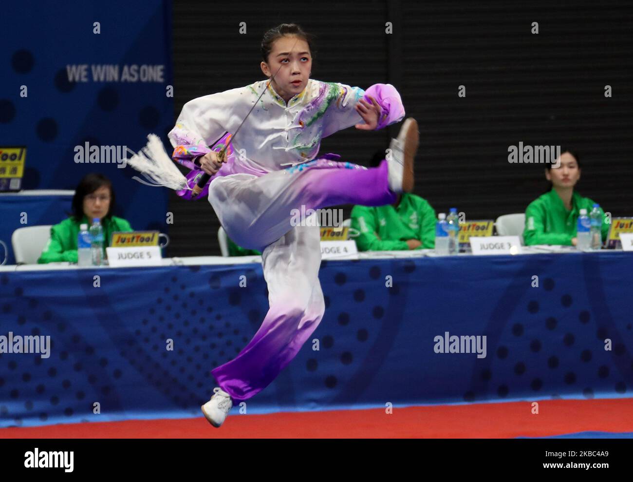 Myat Noe Eain of Myanmar performs her routine during the Wushu Taoulu Women's Taijijiann event ...