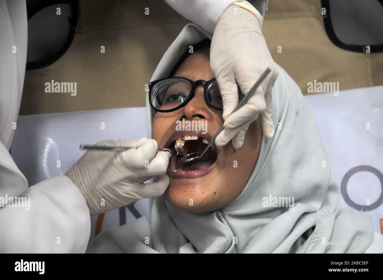 The team of doctors examined teeth free of charge for disability ...