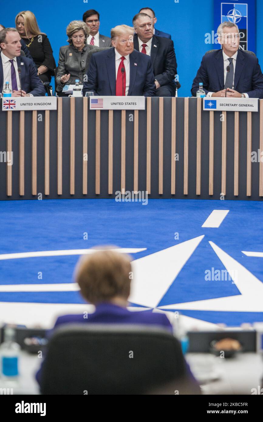 Donald Trump, center, President of the United States and Jens ...