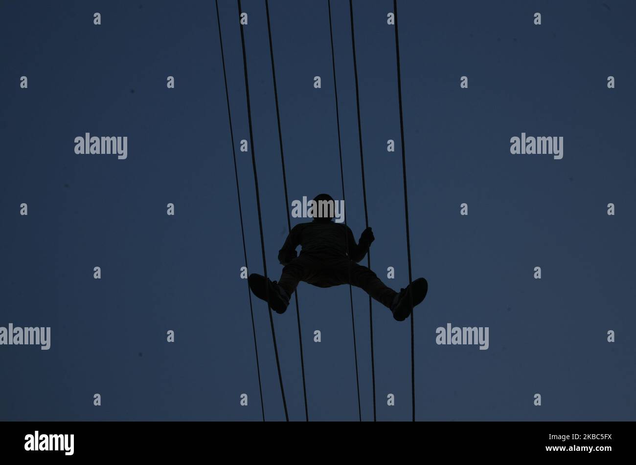 Indian electrician fixes electric wires hi-res stock photography and ...