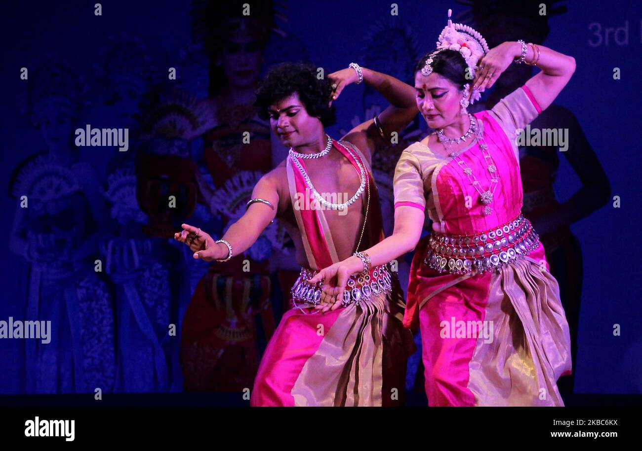 An Indian dancing couple performing traditional dance of Odisha ...