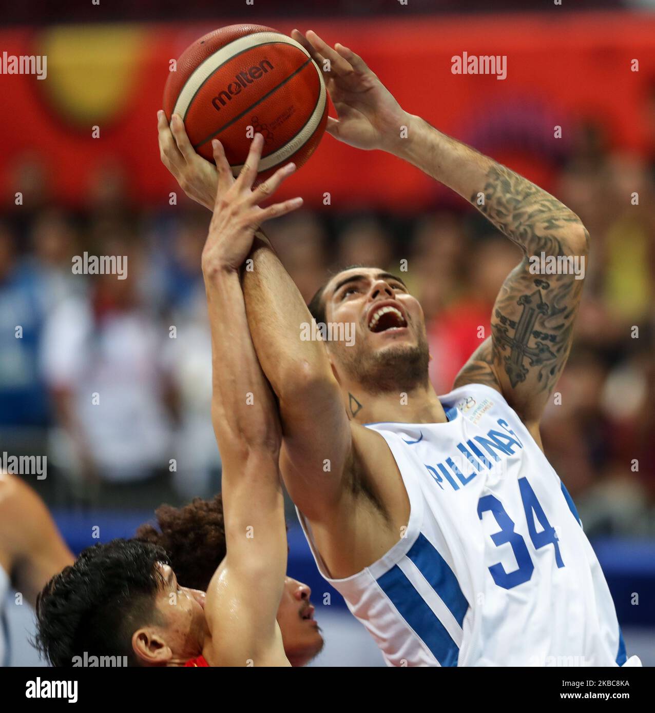Christian Standhardinger of the Philippines attacks the basket during ...
