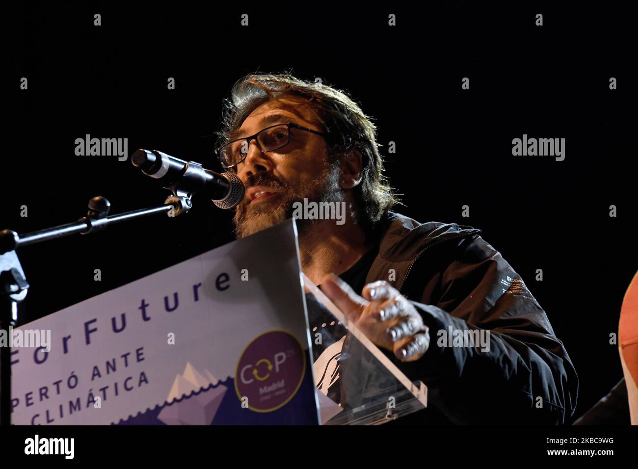 Spanish actor Javier Bardem speaks onstage during a mass climate march ...
