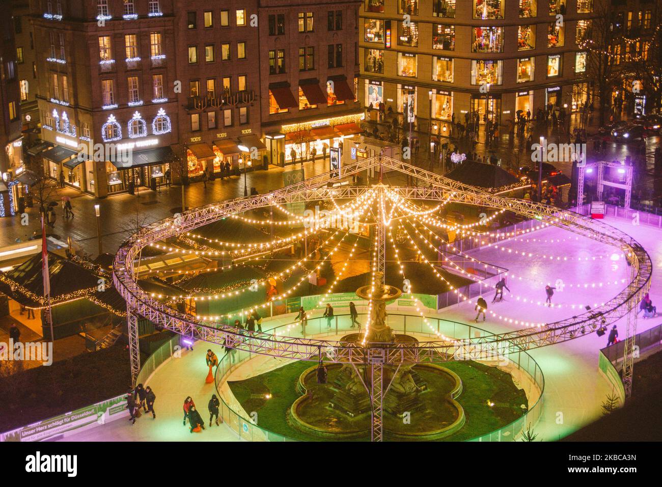 A view of the illuminated Christmas market and Ice Rink at the city ...