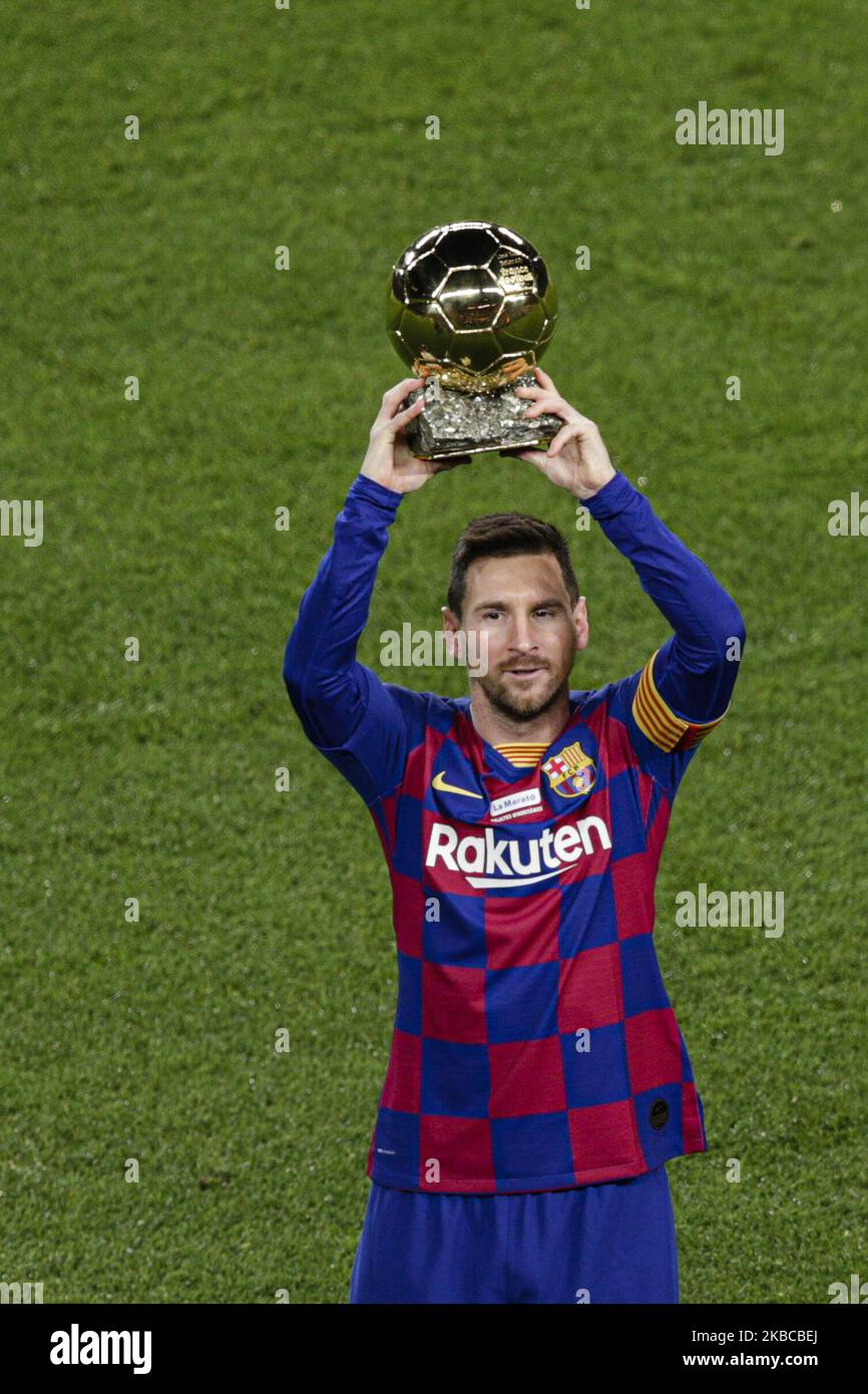 10 Lionel Messi from Argentina of FC Barcelona showing his sixth ballon ...