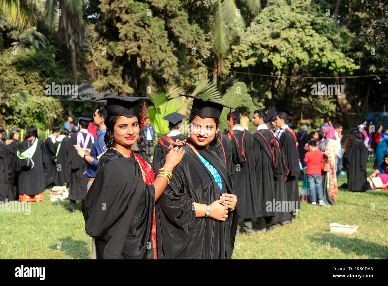 A group of graduates expressing their delight in front of the Curzon ...