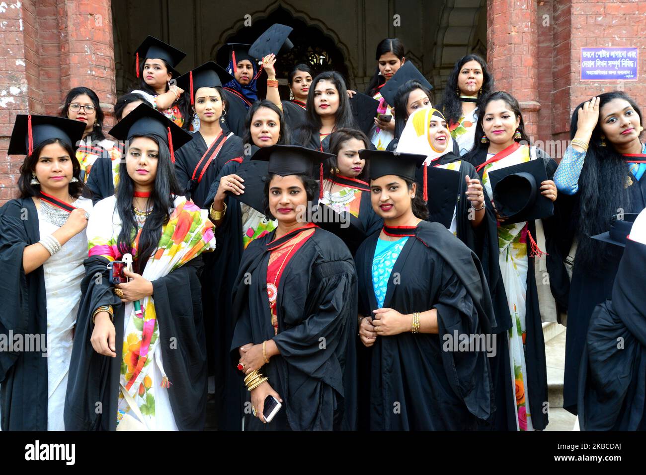 A group of graduates expressing their delight in front of the Curzon ...