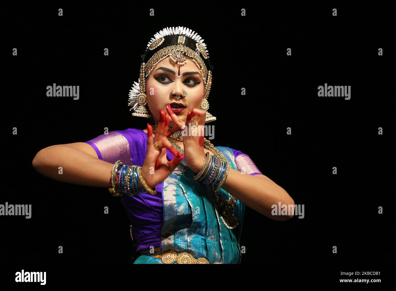 Tamil Bharatnatyam dancer performs an expressive dance during her ...