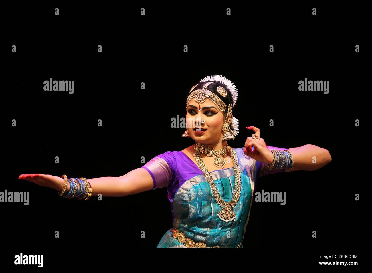 Tamil Bharatnatyam dancer performs an expressive dance during her ...