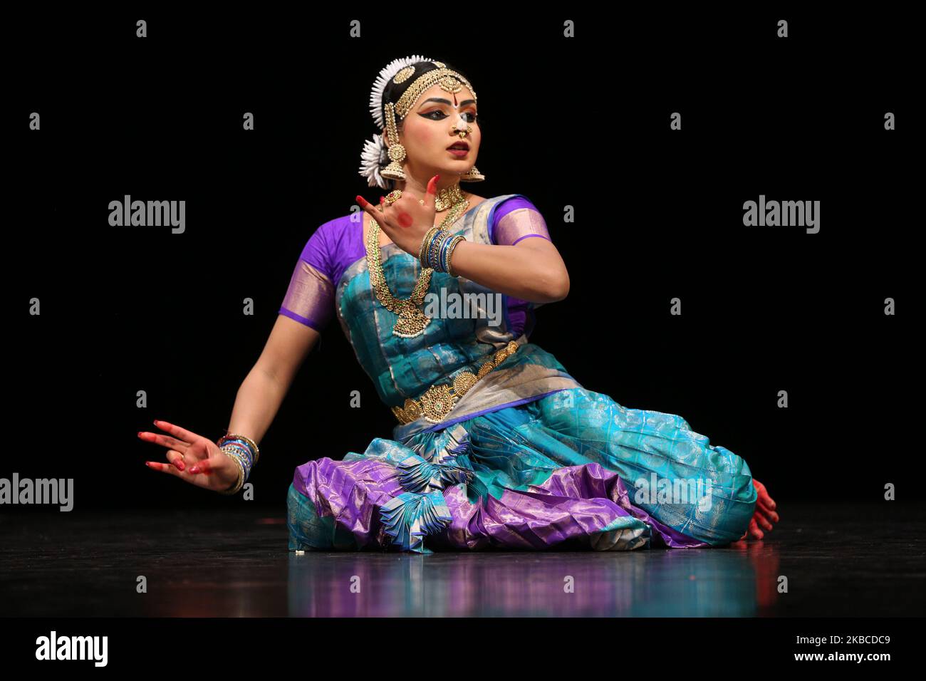 Tamil Bharatnatyam dancer performs an expressive dance during her ...