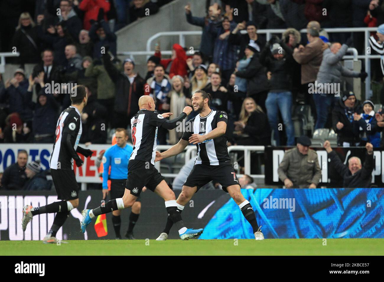Jonjo Shelvey of Newcastle United celebrates with Andy Carroll after ...