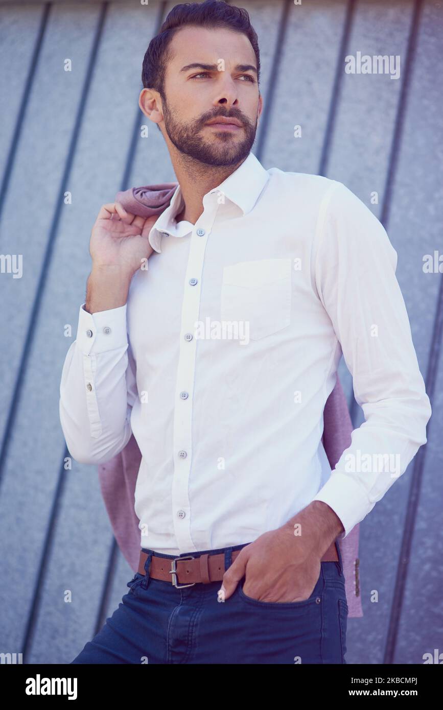 All the fashion greats keep it simple. a well-dressed young man posing ...