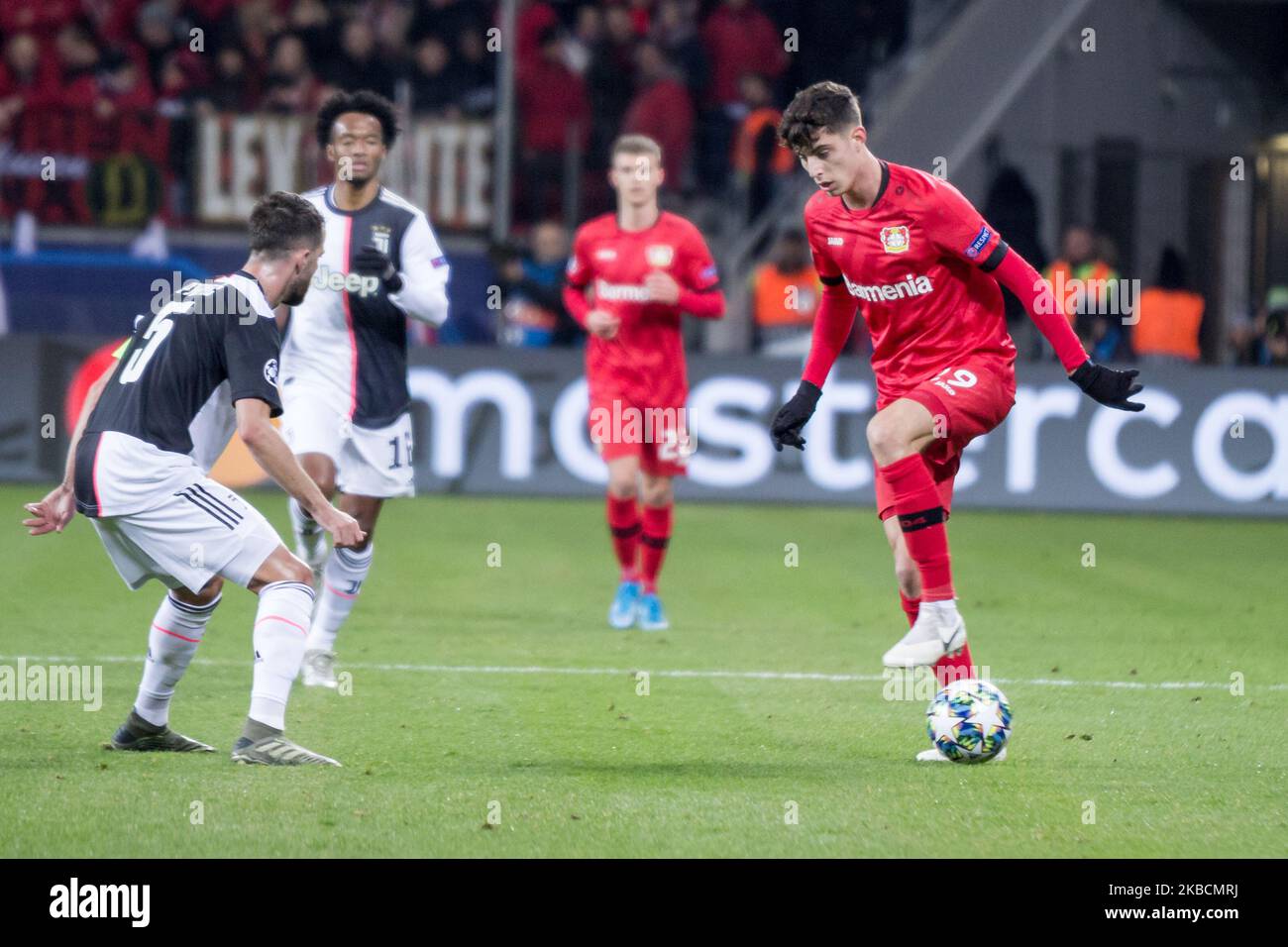 Kai Havertz of Leverkusen and Miralem Pjani? of Juventus during the ...