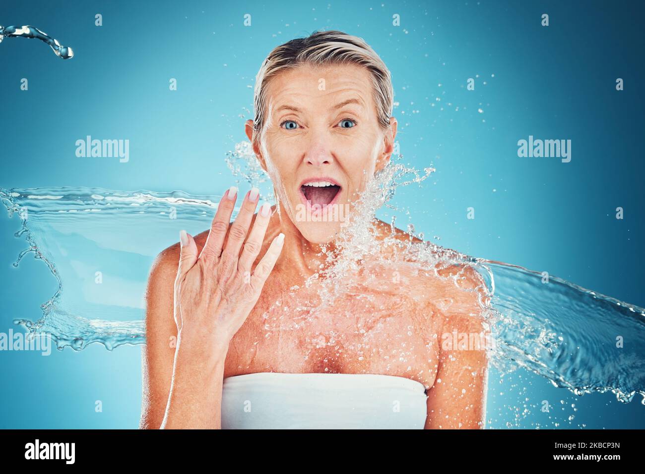 Beauty splash, senior woman and wow face in studio for cleaning, fresh ...