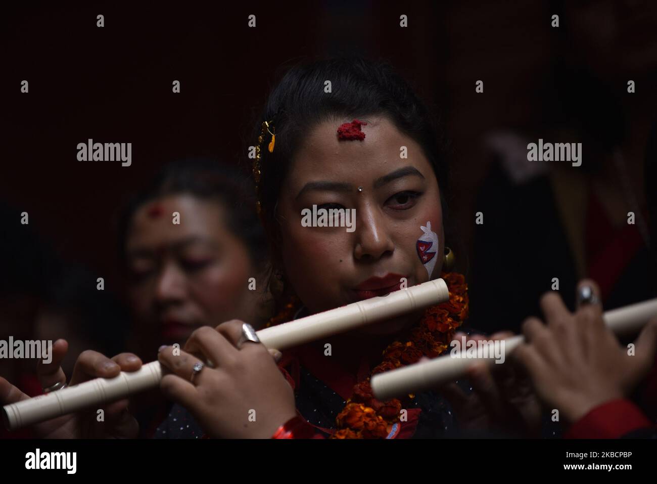 People from Newar community playing traditional instruments during a ...