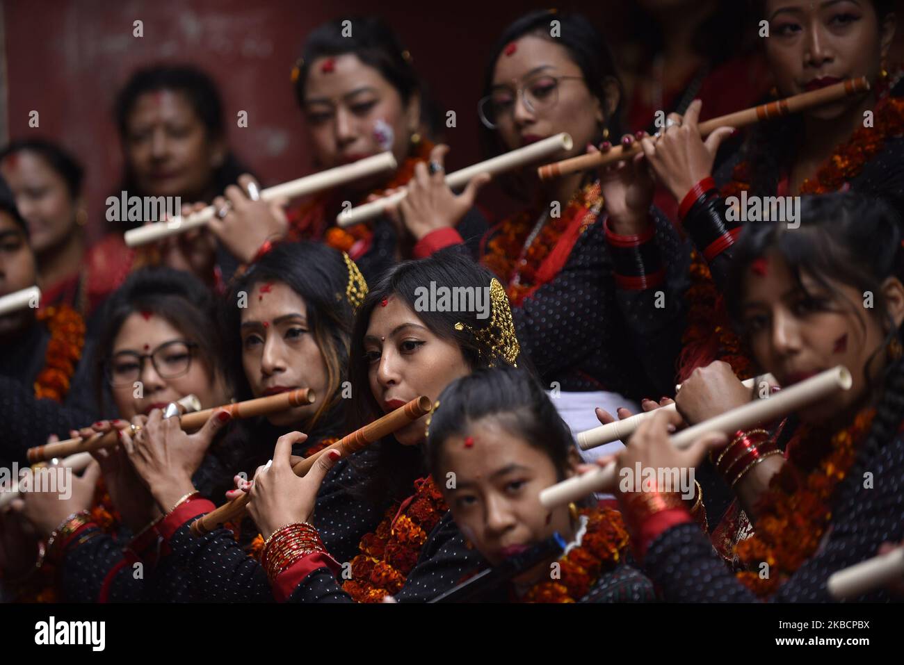 People from Newar community playing traditional instruments during a ...