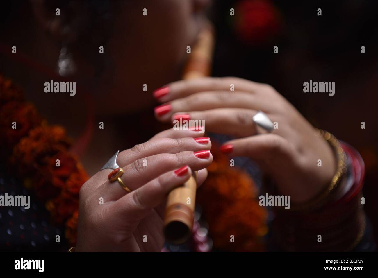 People from Newar community playing traditional instruments during a ...
