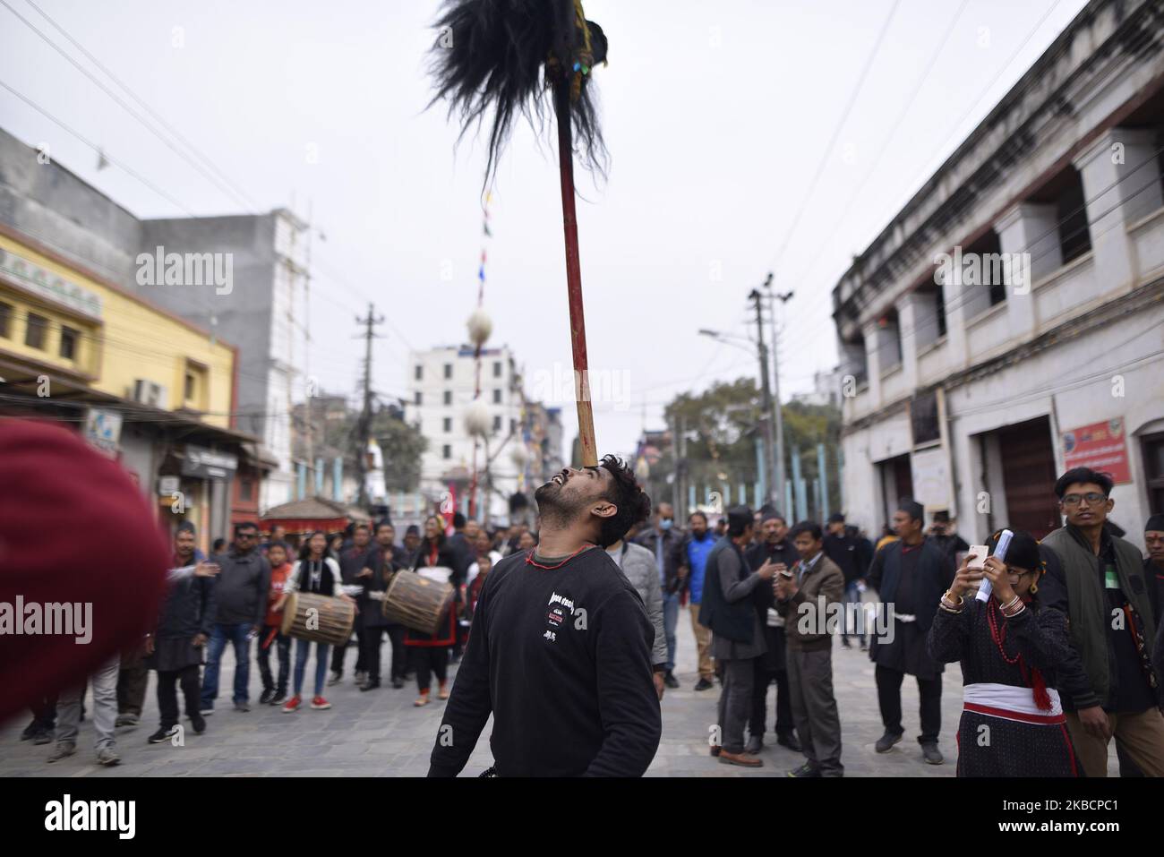 People from Newar community playing traditional instruments during a ...