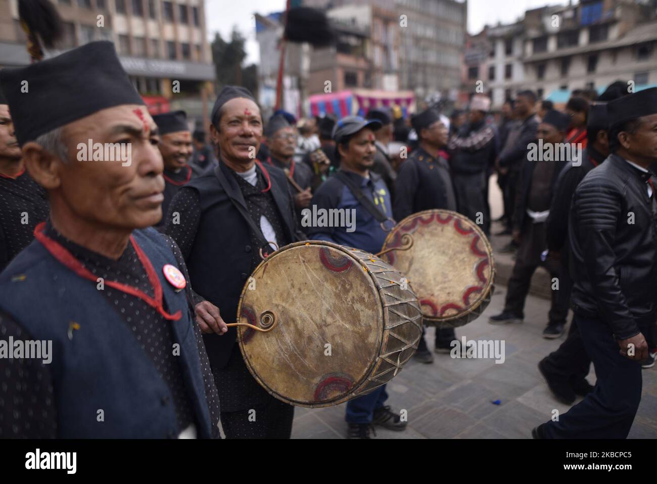 People from Newar community playing traditional instruments during a ...