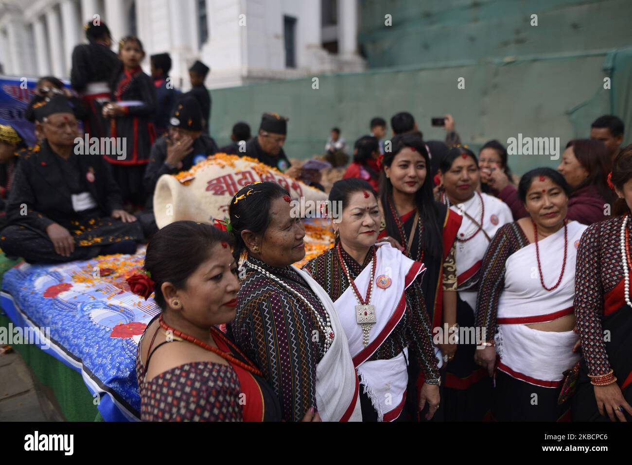 People from Newar community in a traditional attire pose for the photos ...