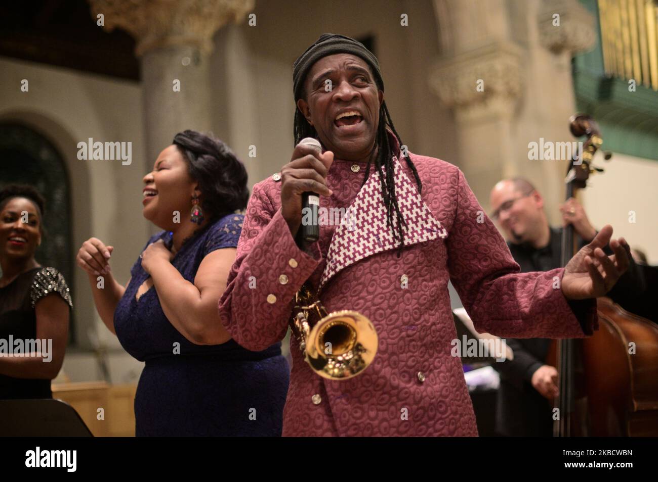 Hannibal Lokumbe honors Dr. Kim Phc during a concert that includes ...