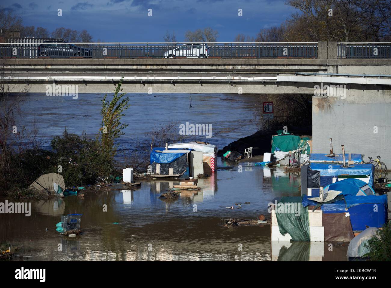 After heavy rains, slums on the Garonne river banks were flooded by the ...
