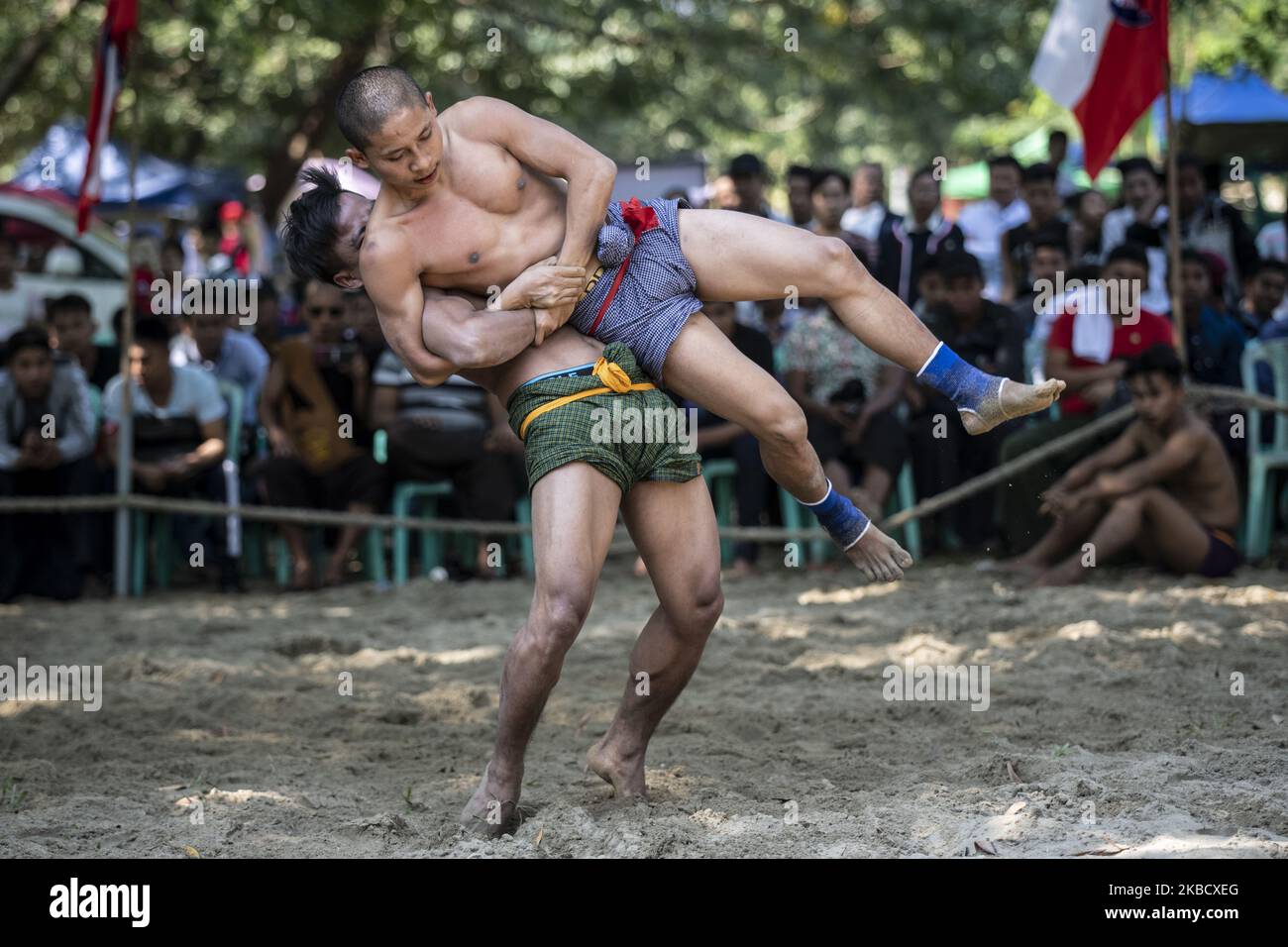 Wrestlers compete in a Rakhine traditional wrestling known as â€œKyinâ ...