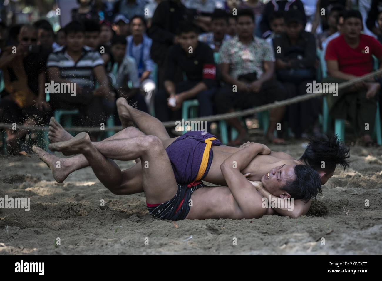 Wrestlers compete in a Rakhine traditional wrestling known as â€œKyinâ ...