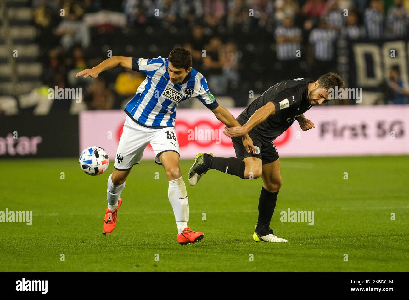 Stefan Medina tries to get passed Gabi during the FIFA Club World Cup ...