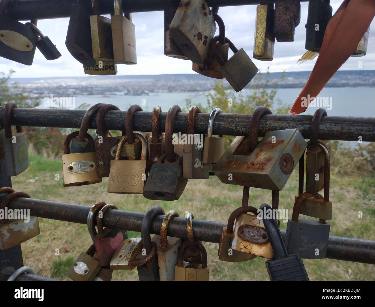 Loving couples locked love locks on the alley of the Panorama near ...