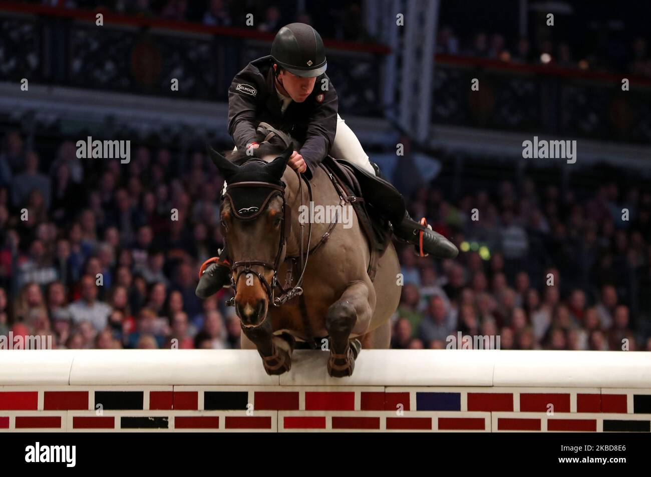Human on horse jumping event hi-res stock photography and images - Alamy