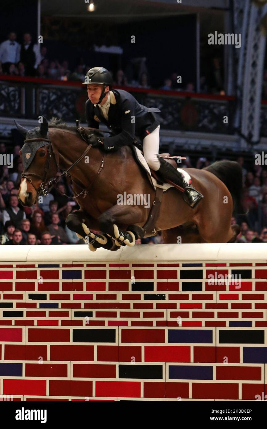 William Whitaker riding RMF Charly, clears the wall during the Cayenne ...