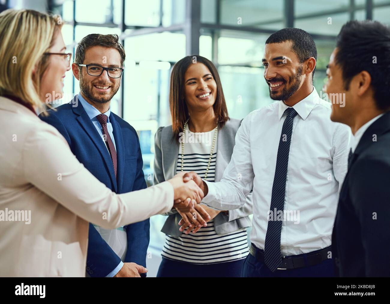 Together wed make quite a formidable team. businesspeople shaking hands ...