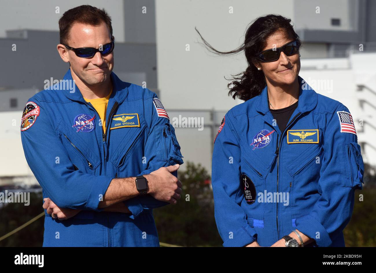 NASA astronauts Josh Cassada, and Suni Williams listen at a press ...