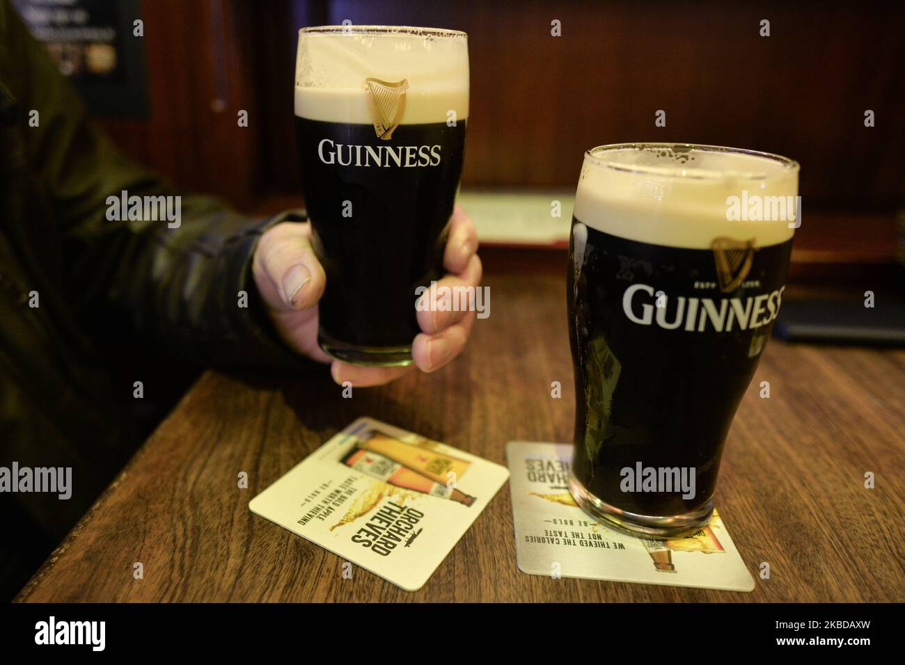A man enjoys a pint of Guinness in The Bankers Bar, in Dublin. On ...