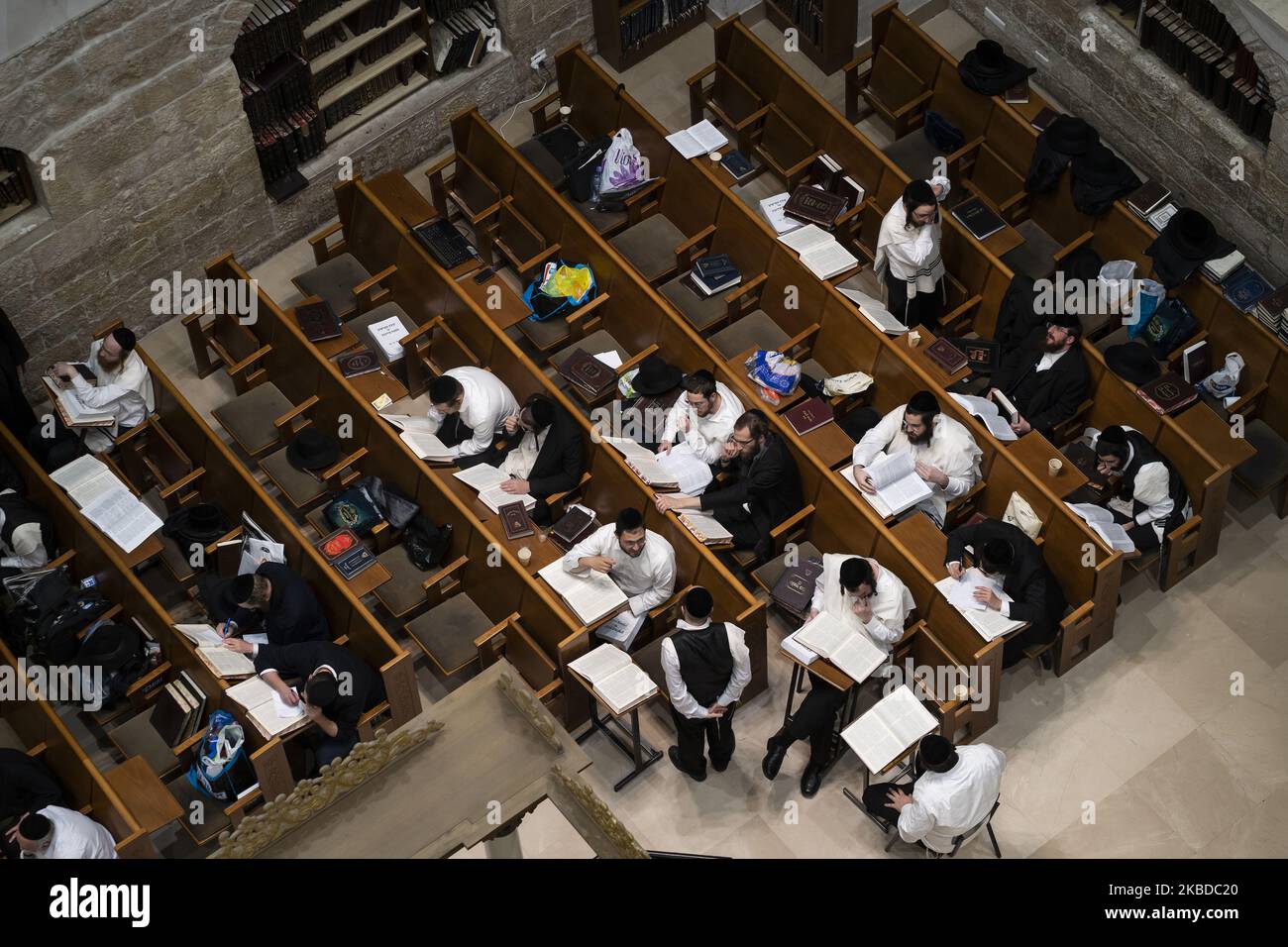 Jews studying inside the Hurva Synagogue in the city of Jerusalem ...