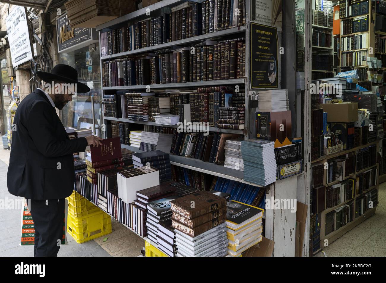 A Jew looks at some books, in a bookstore in the ultra-orthodox ...