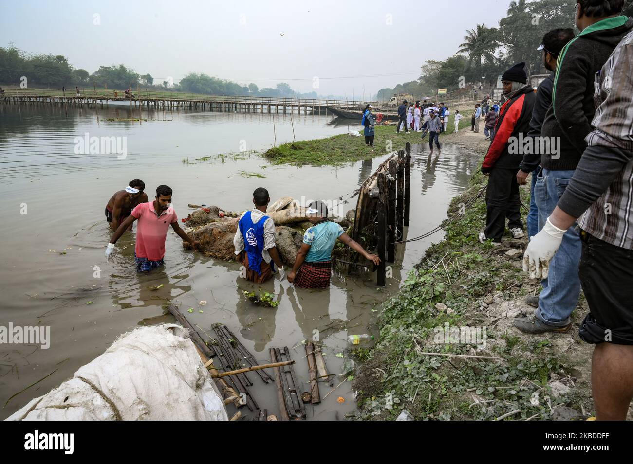 People remove garbage from river. A walk has been organized to save the ...