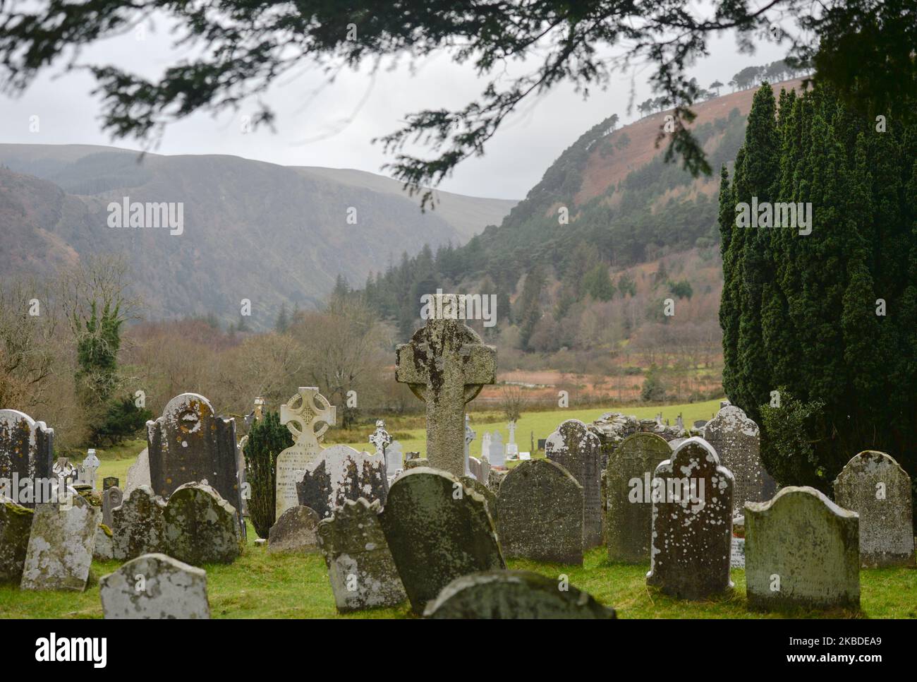 A view of tombstones and Celtic crosses inside an Early Medieval ...