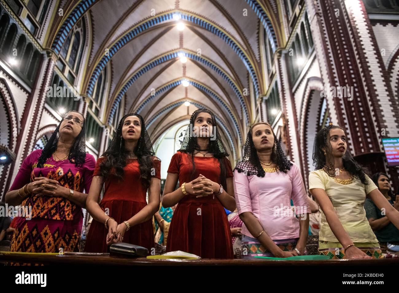 Myanmar Christian devotees pray during a Christmas Eve mass at St. Mary ...
