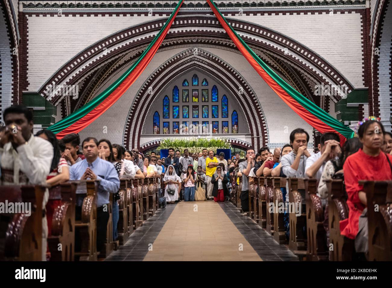Myanmar Christian devotees pray during a Christmas Eve mass at St. Mary ...