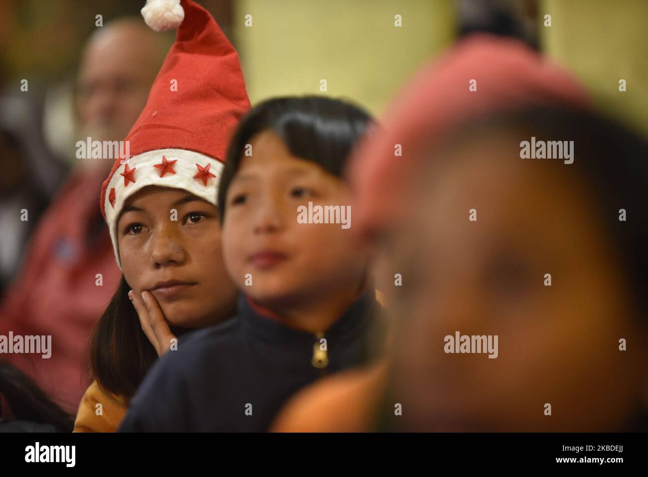 Nepalese Christian Kids attend on Holy Mass of worshipers singing Carol ...