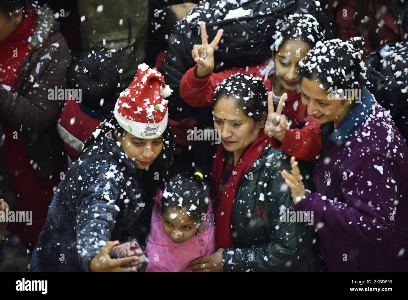 Nepalese People takes selfie with an artificial snow fall in Big Mall ...