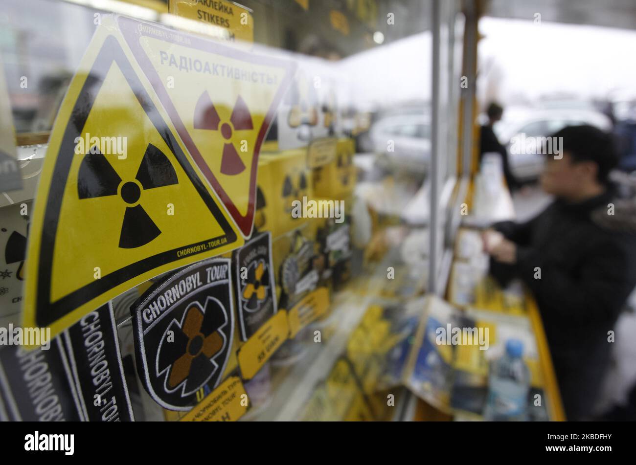 A visitor stands next to a souvenir shop on the Dytyatky checkpoint in ...